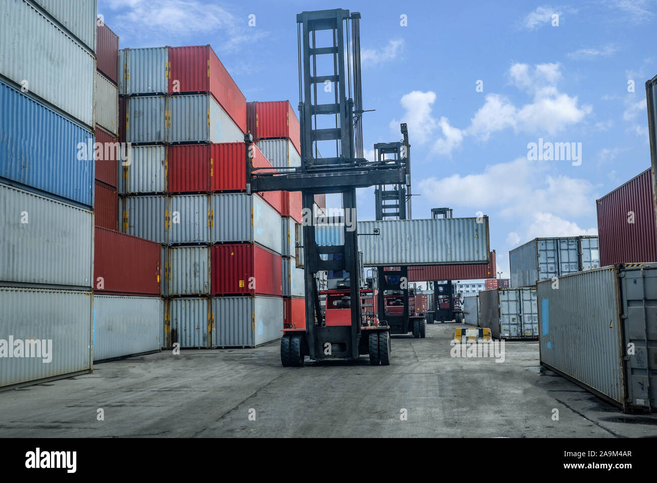Container handlers in the harbor Informational communication Stock ...