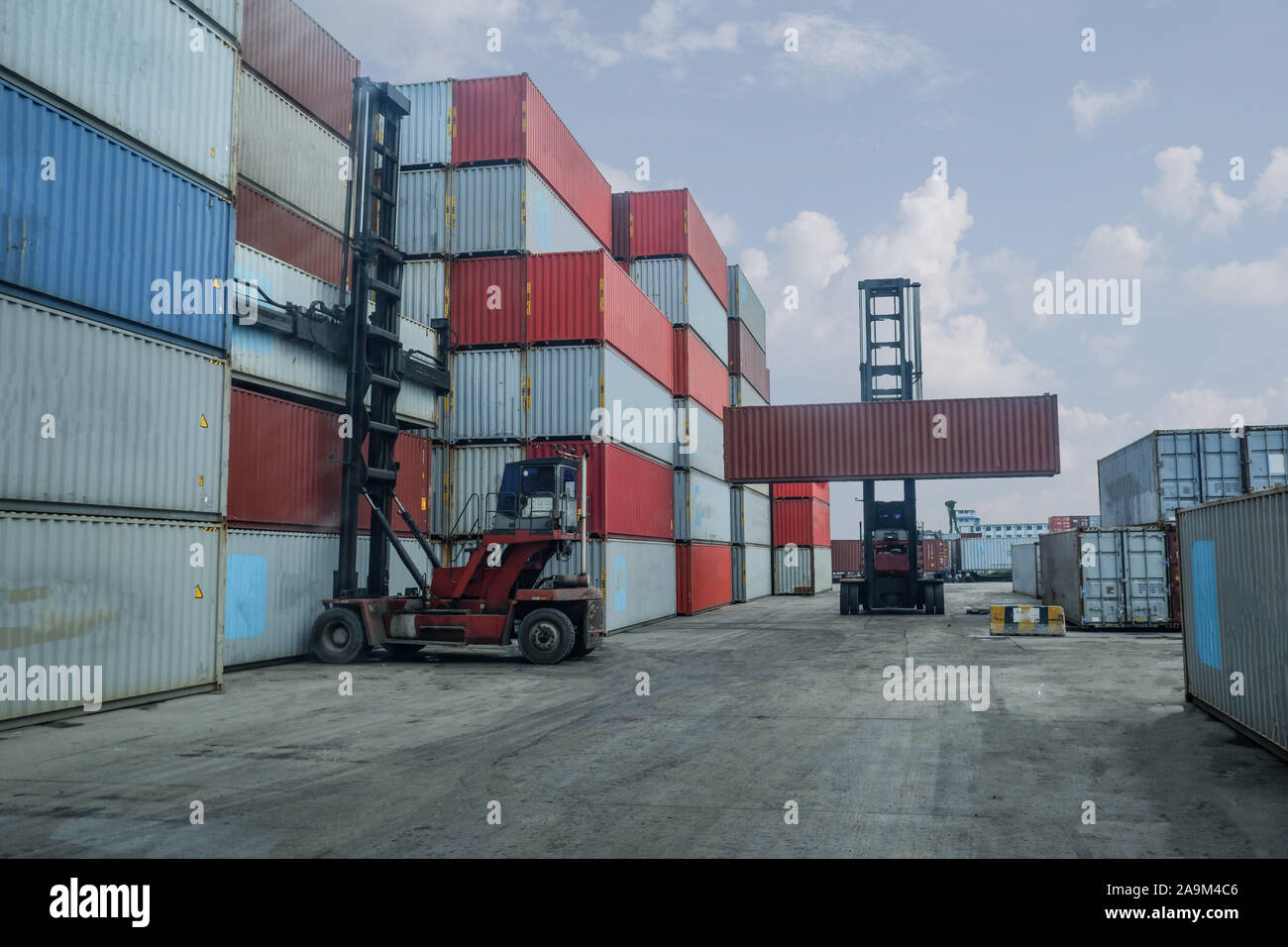 Container handlers in the harbor Informational communication Stock ...