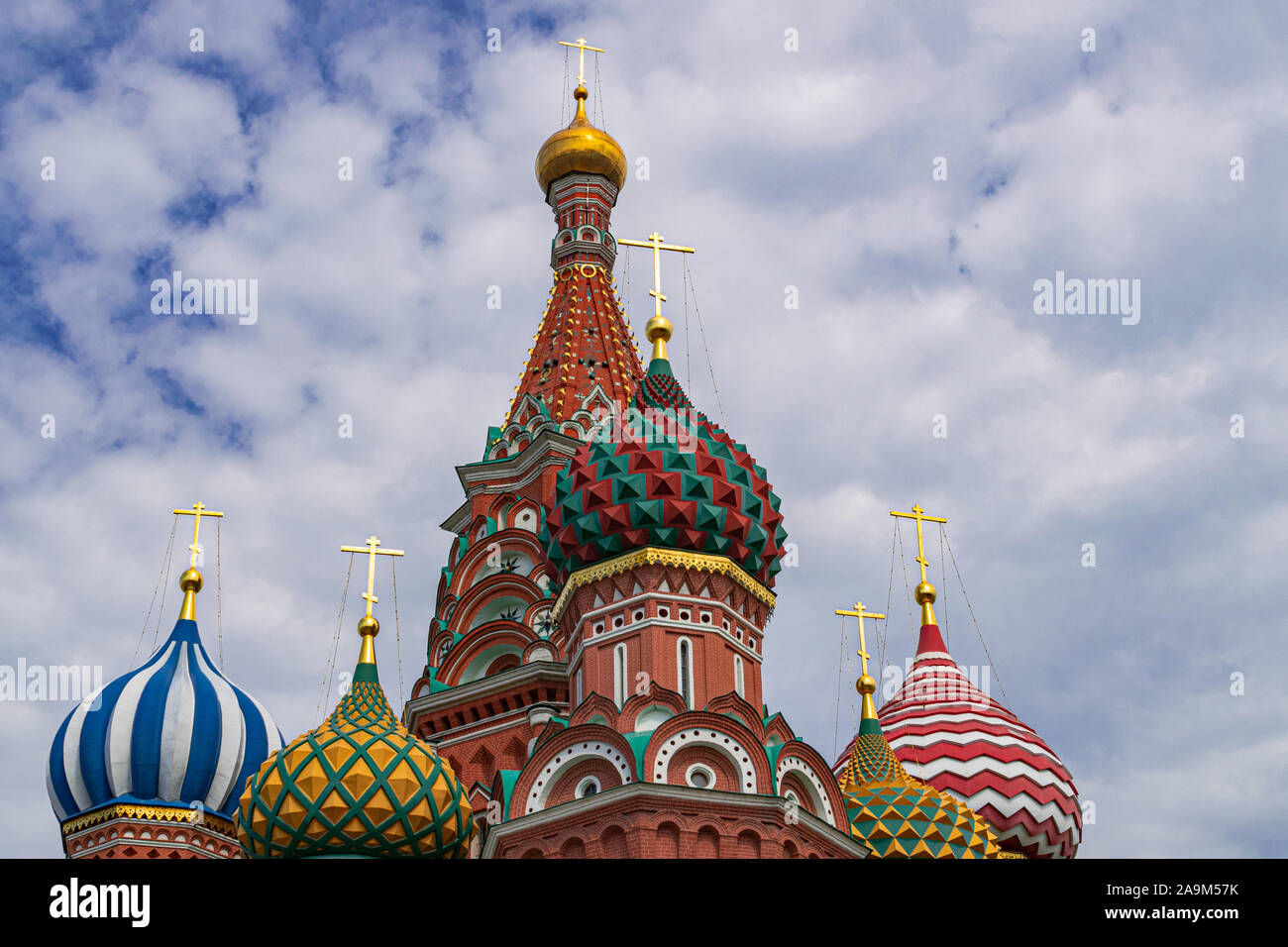 Saint Basil´s colorful domes, with white clouds background, Moscow ...