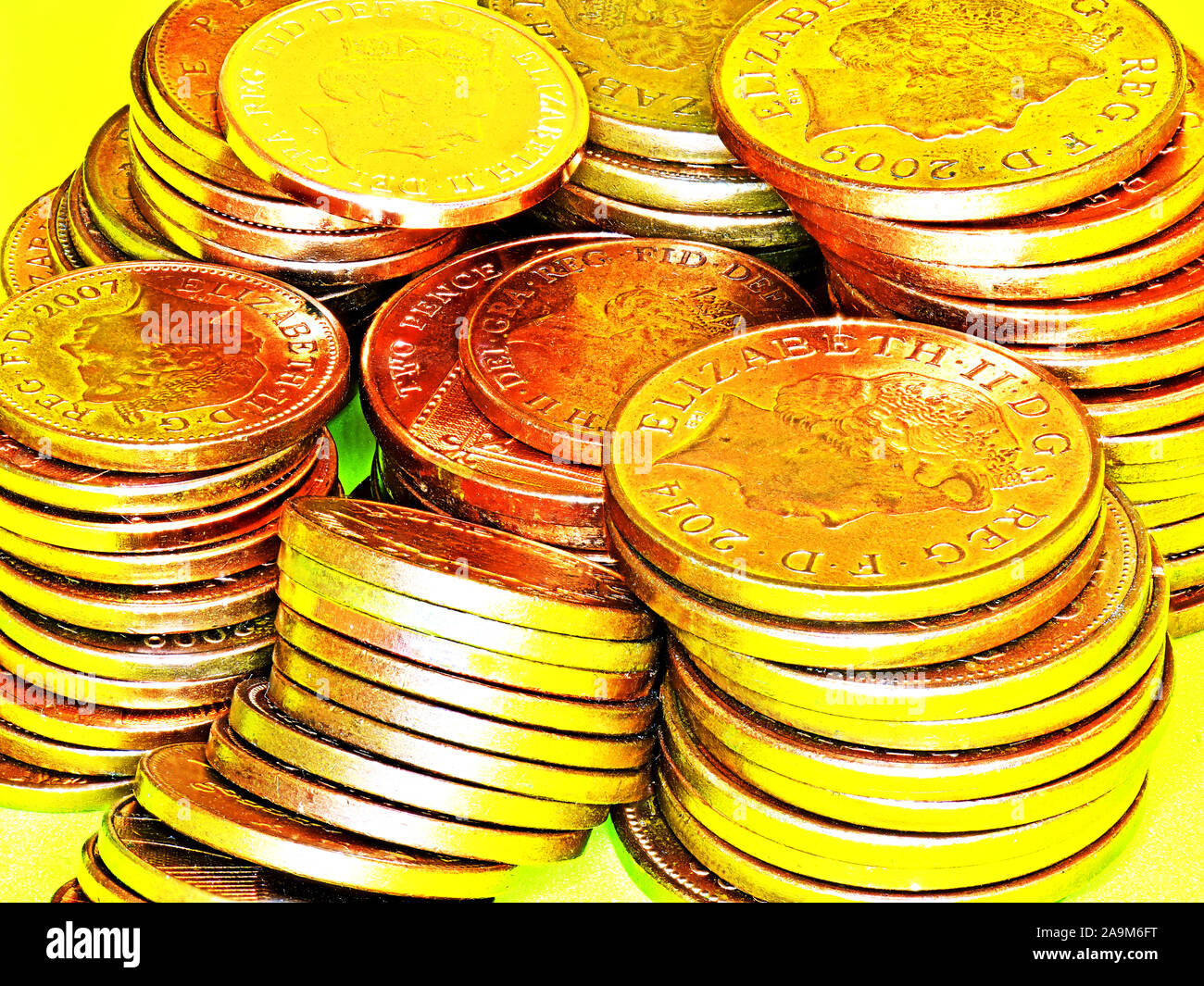 Golden money coins Stock Photo - Alamy