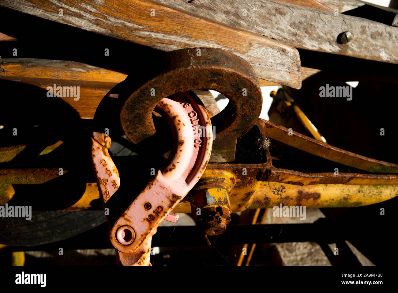 Rusty metal coupler on old unused farmyard machinery Stock Photo - Alamy