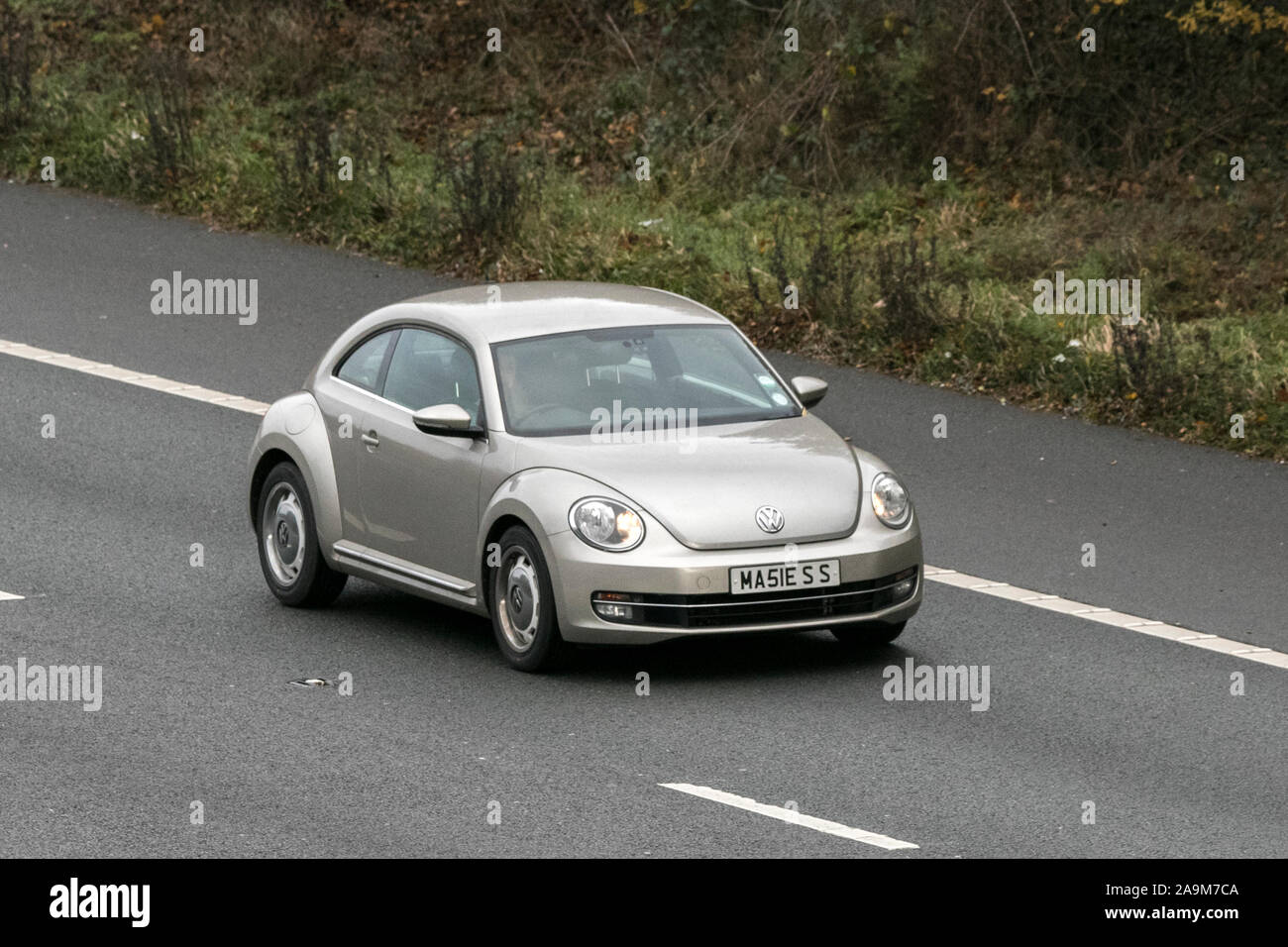 2013 Volkswagen New Beetle Design TDI compact car; UK Vehicular traffic ...