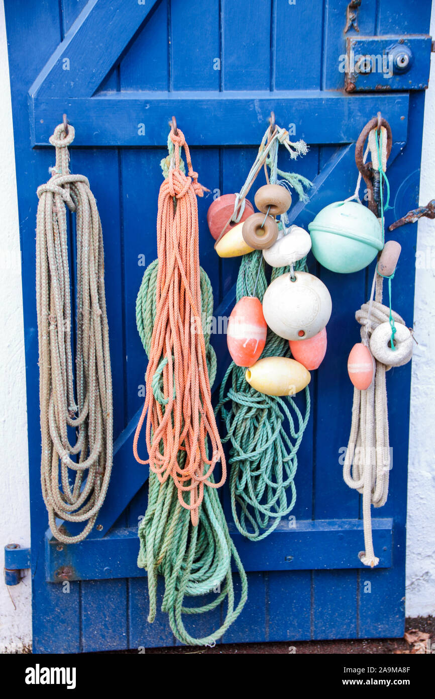 wooden blue window with hanging ropes in the old port of Biarritz Stock ...