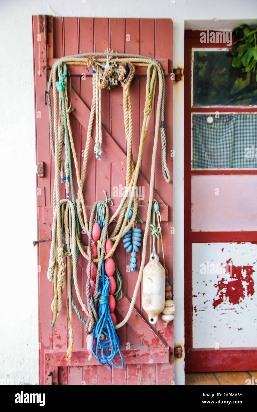 wooden blue window with hanging ropes in the old port of Biarritz Stock ...