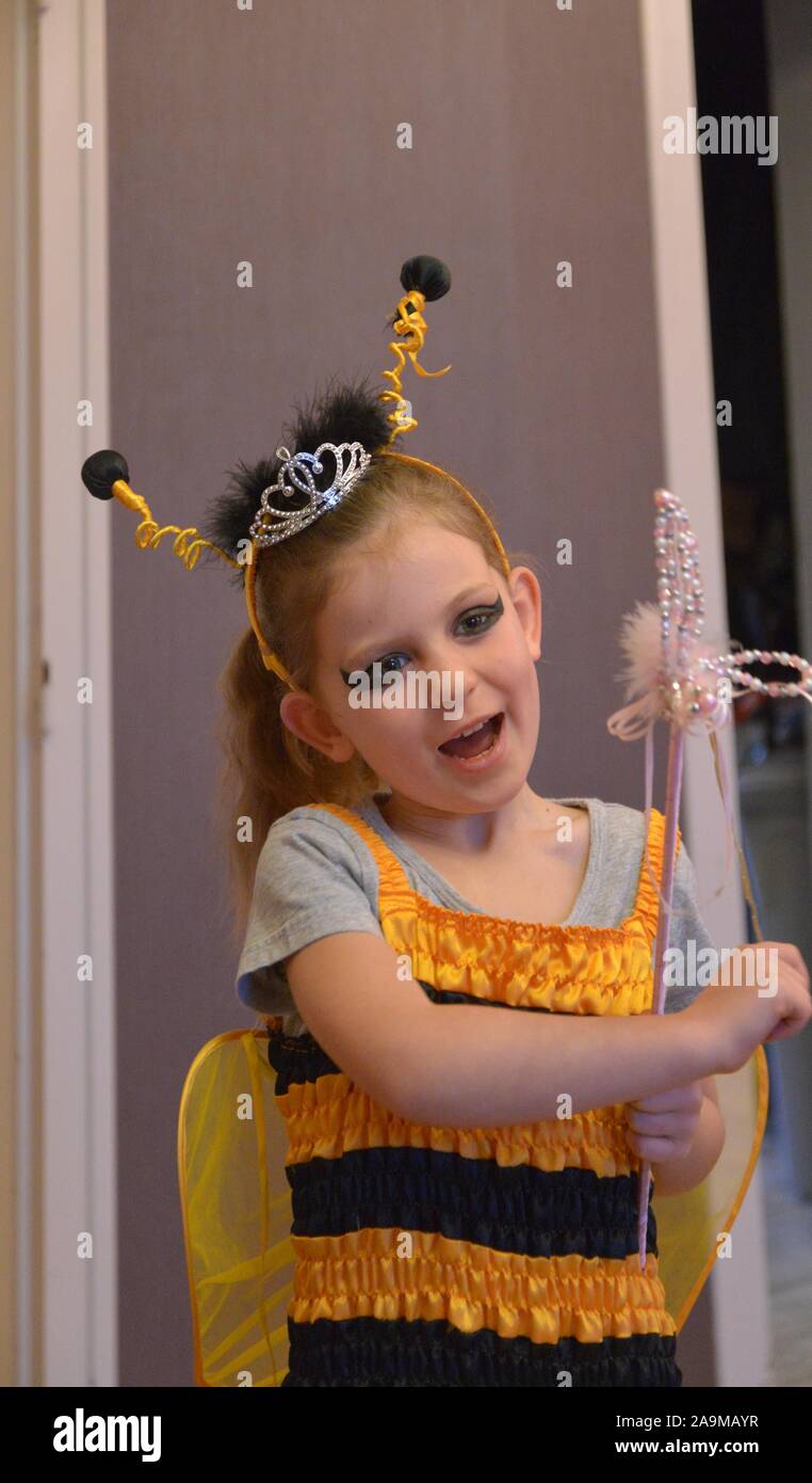 Little girl disguised as a bee France Stock Photo - Alamy