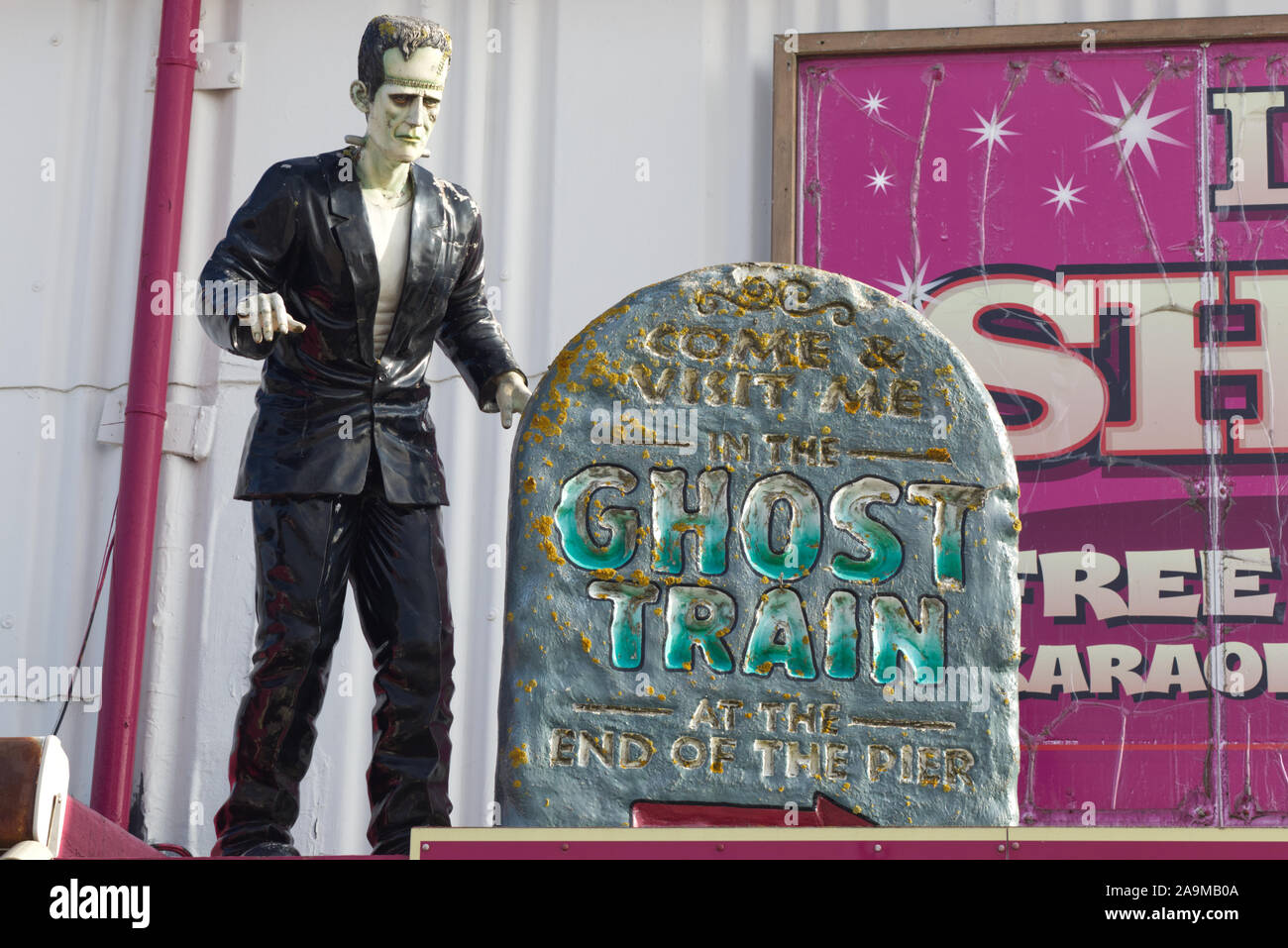 Ghost train at the end of the pier sign Stock Photo - Alamy
