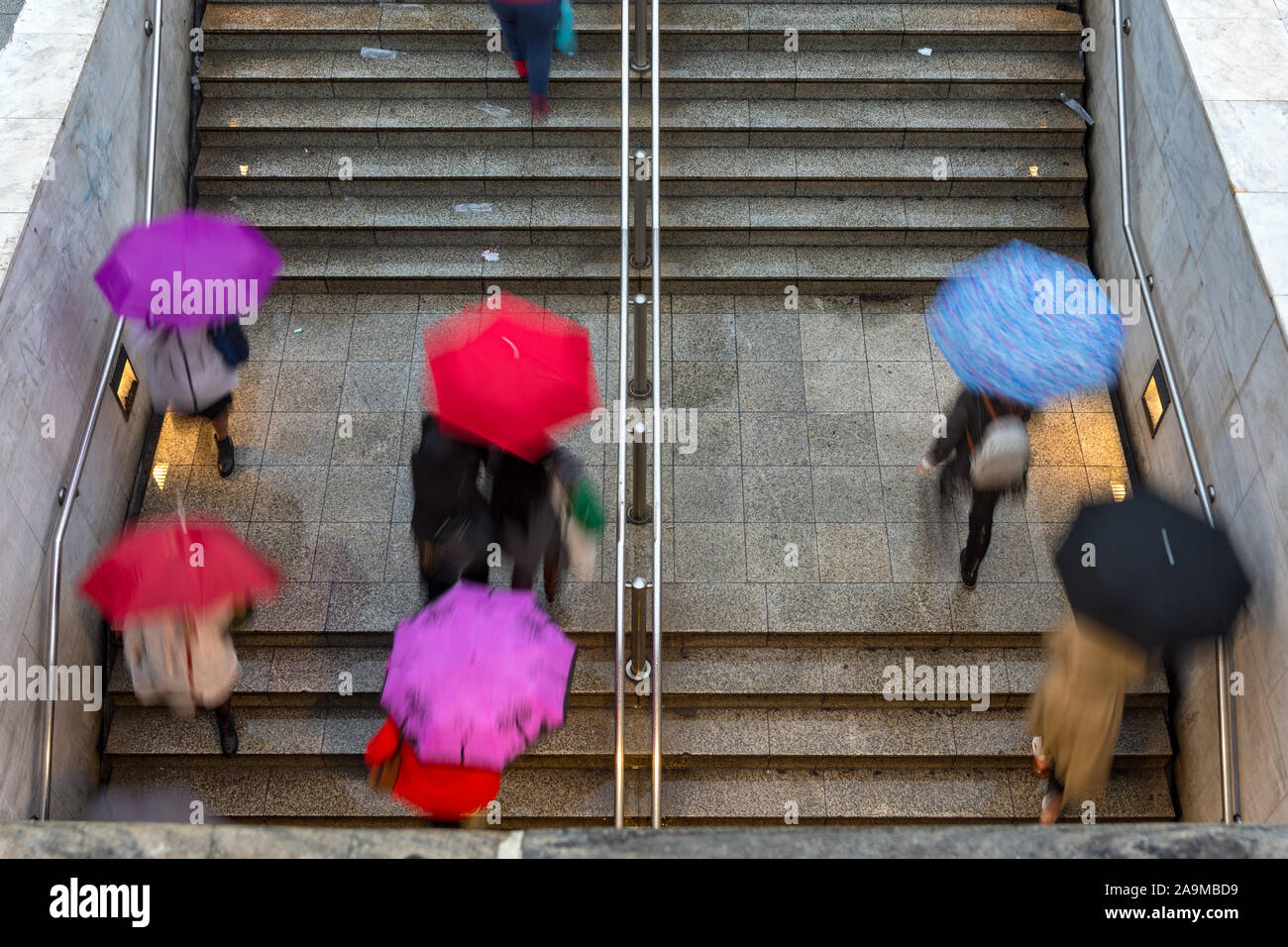 Business People Walking Overhead Stock Photos & Business People Walking ...