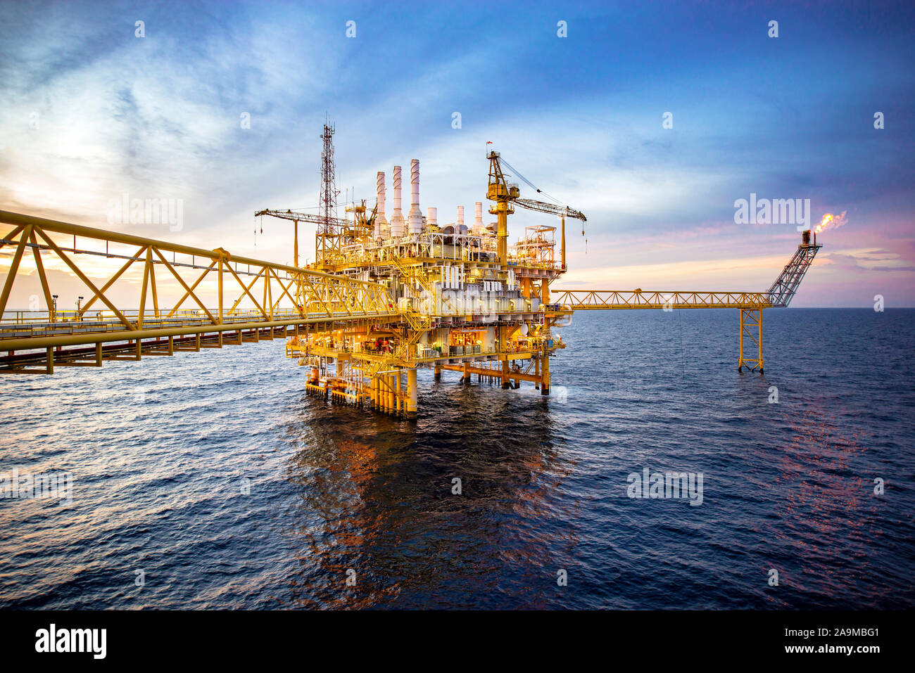 Large offshore drilling rig in the gulf at sunset Stock Photo - Alamy