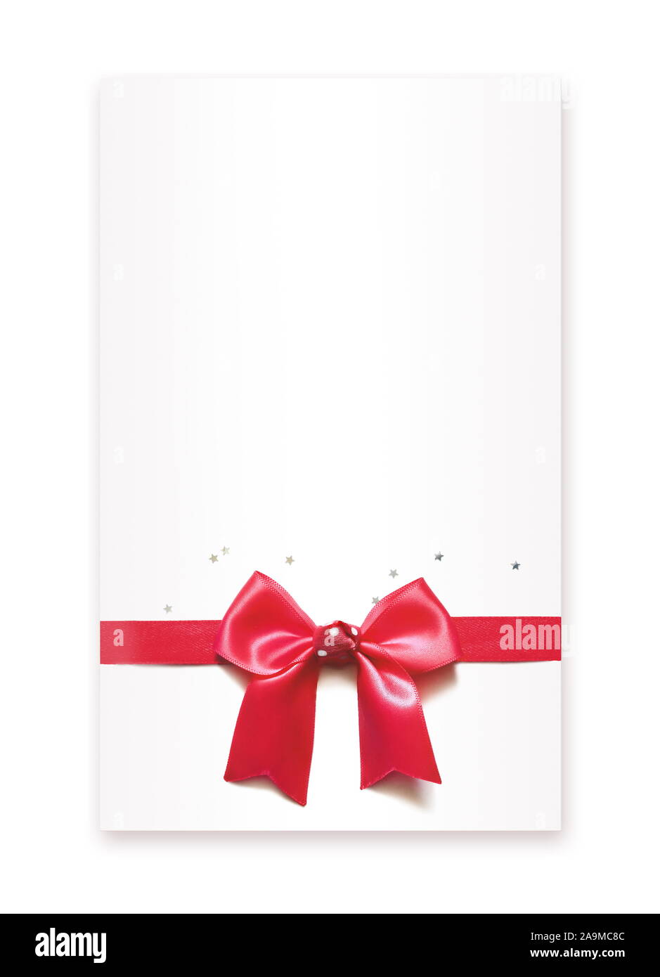 White envelope with red bow on white background Stock Photo - Alamy