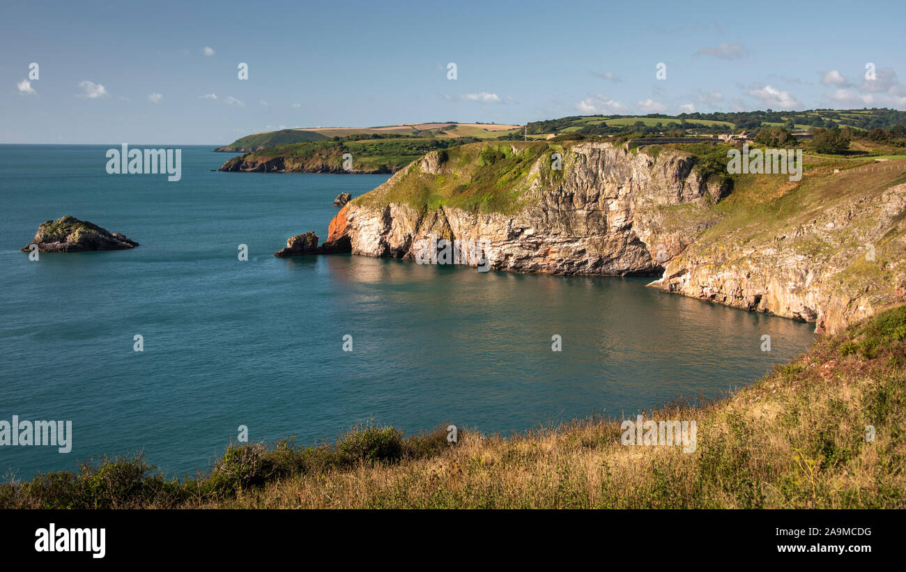 a bright sunny day with a landscape looking up the coast from Berry ...