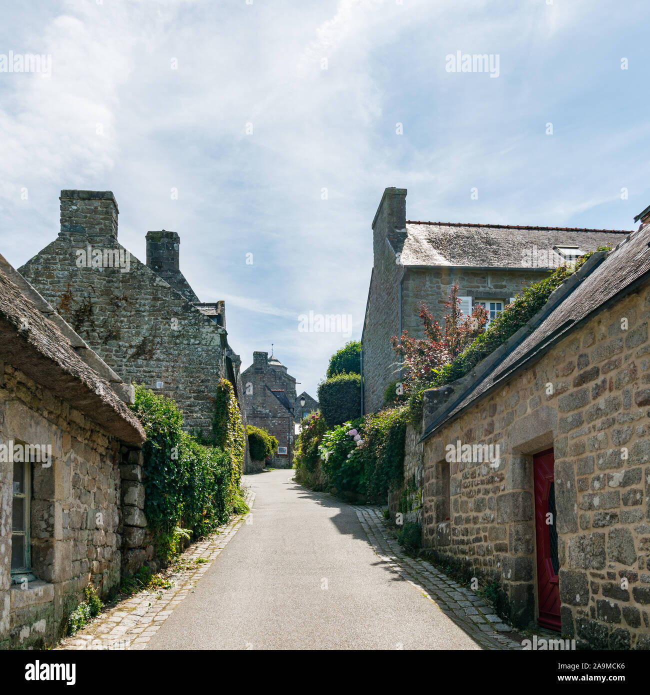 Locronan, Finistere / France - 23 August, 2019: typical Breton stone ...