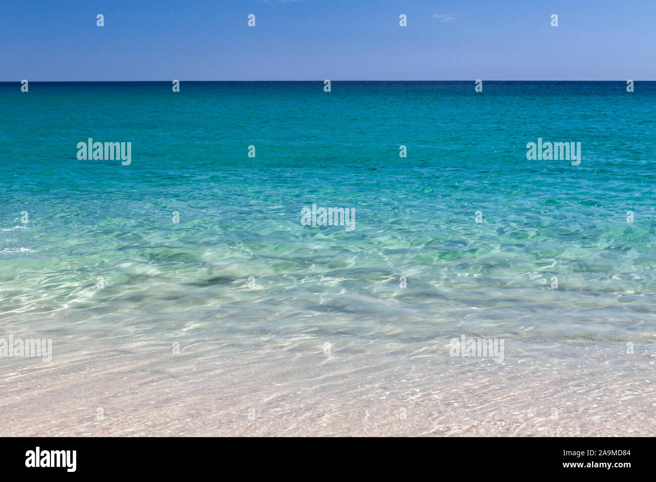 Clear, calm, turquoise blue sea off the coast of Cornwall, England, UK ...