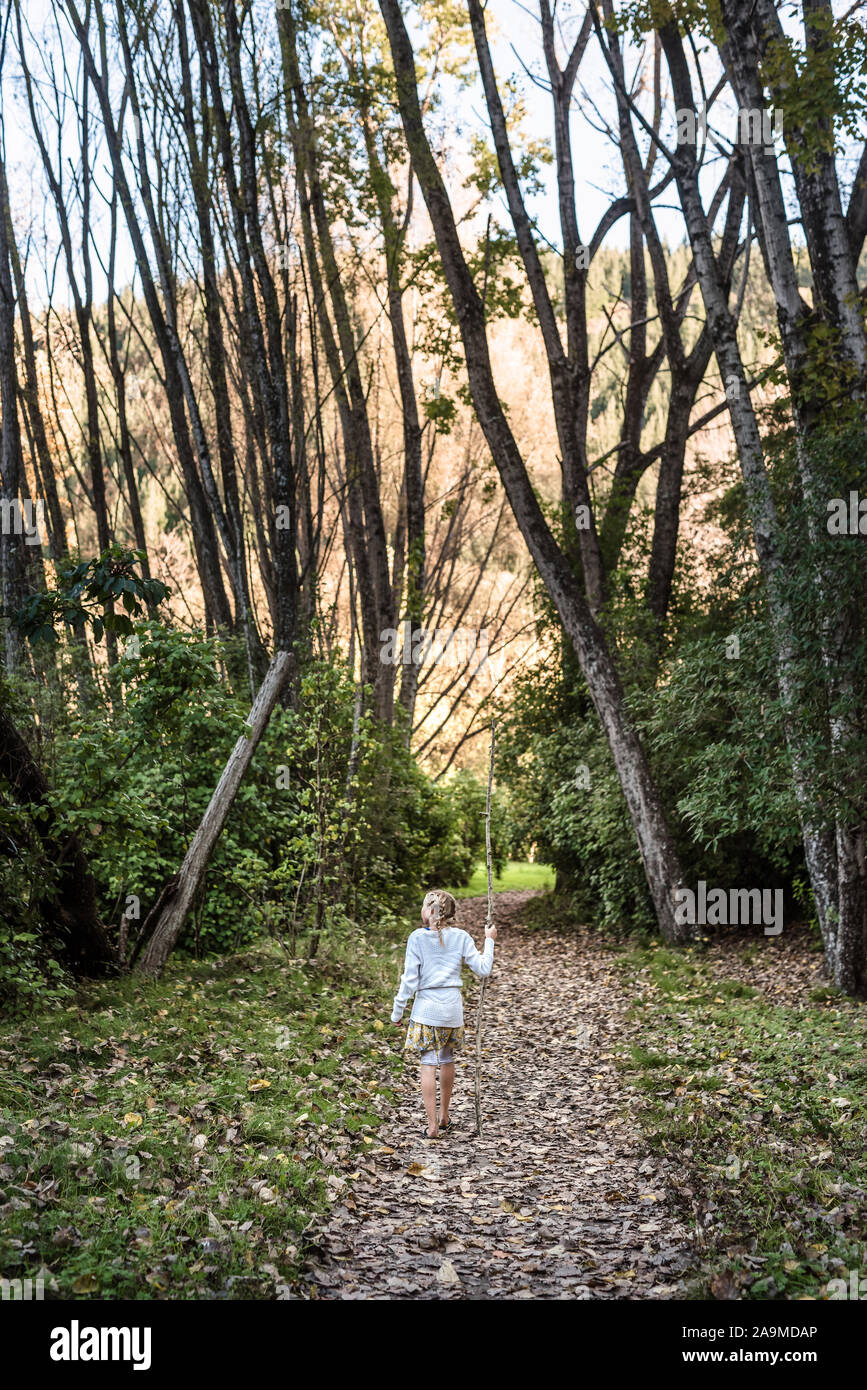 Tween girl hiking in New Zealand forest Stock Photo - Alamy