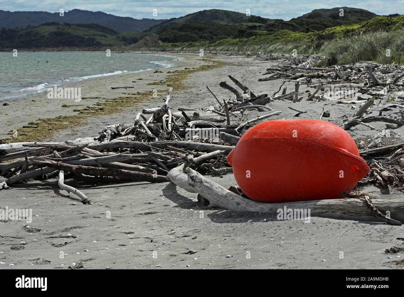 Stranded buoy on the beach Stock Photo - Alamy