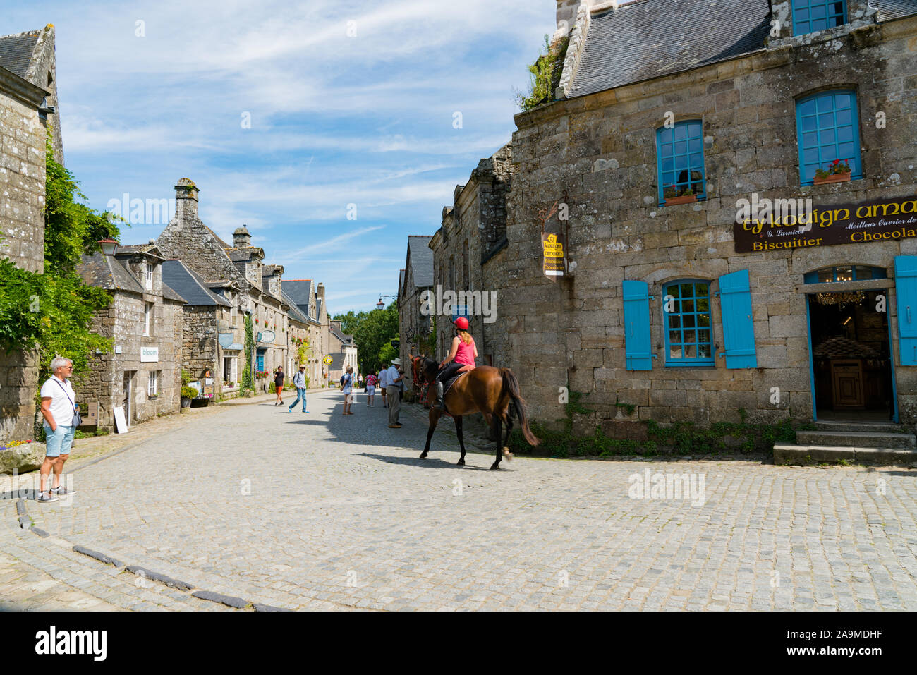 Locronan, Finistere / France - 23 August, 2019: woman on horseback ...