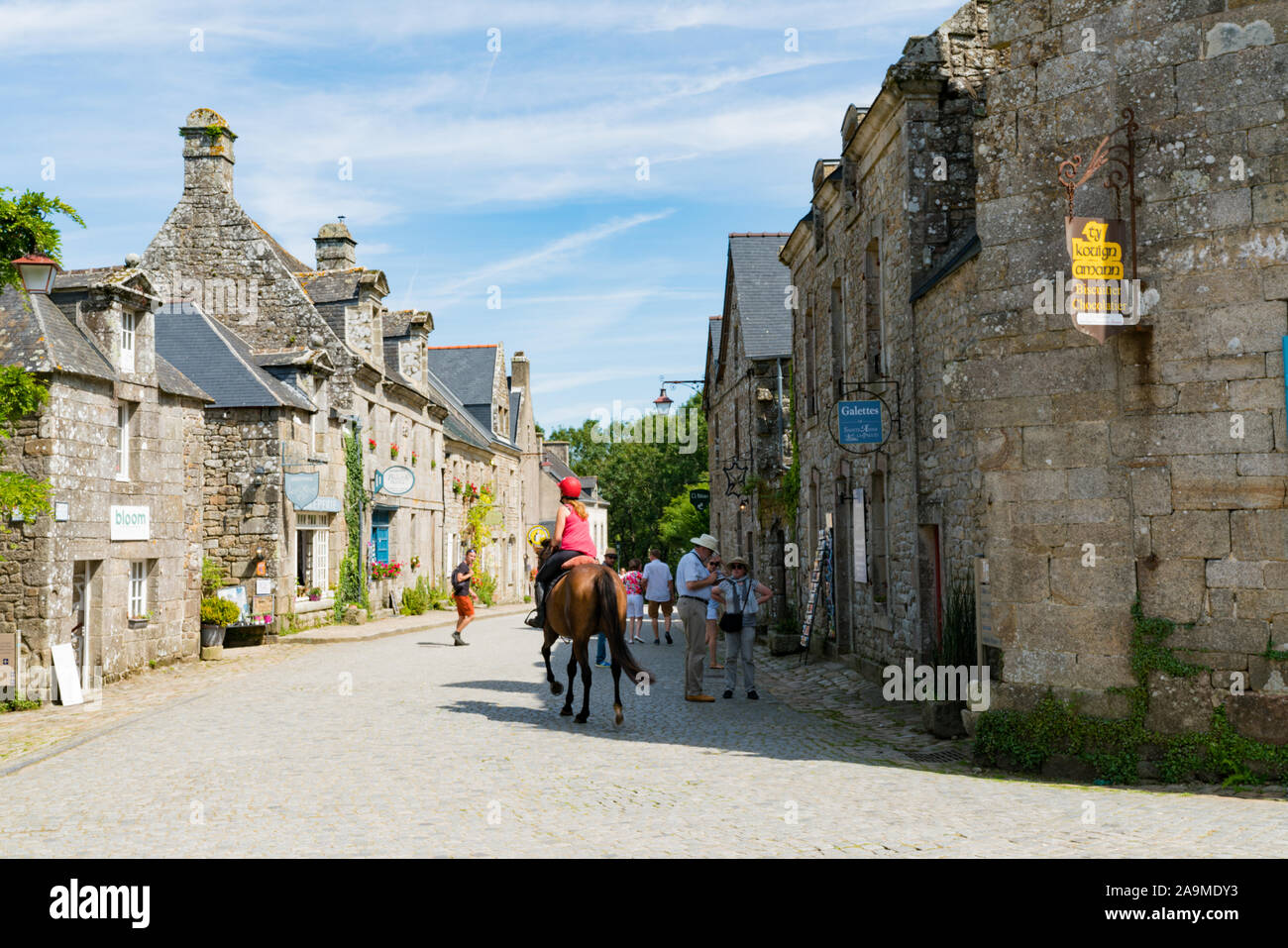 Locronan, Finistere / France - 23 August, 2019: woman on horseback ...