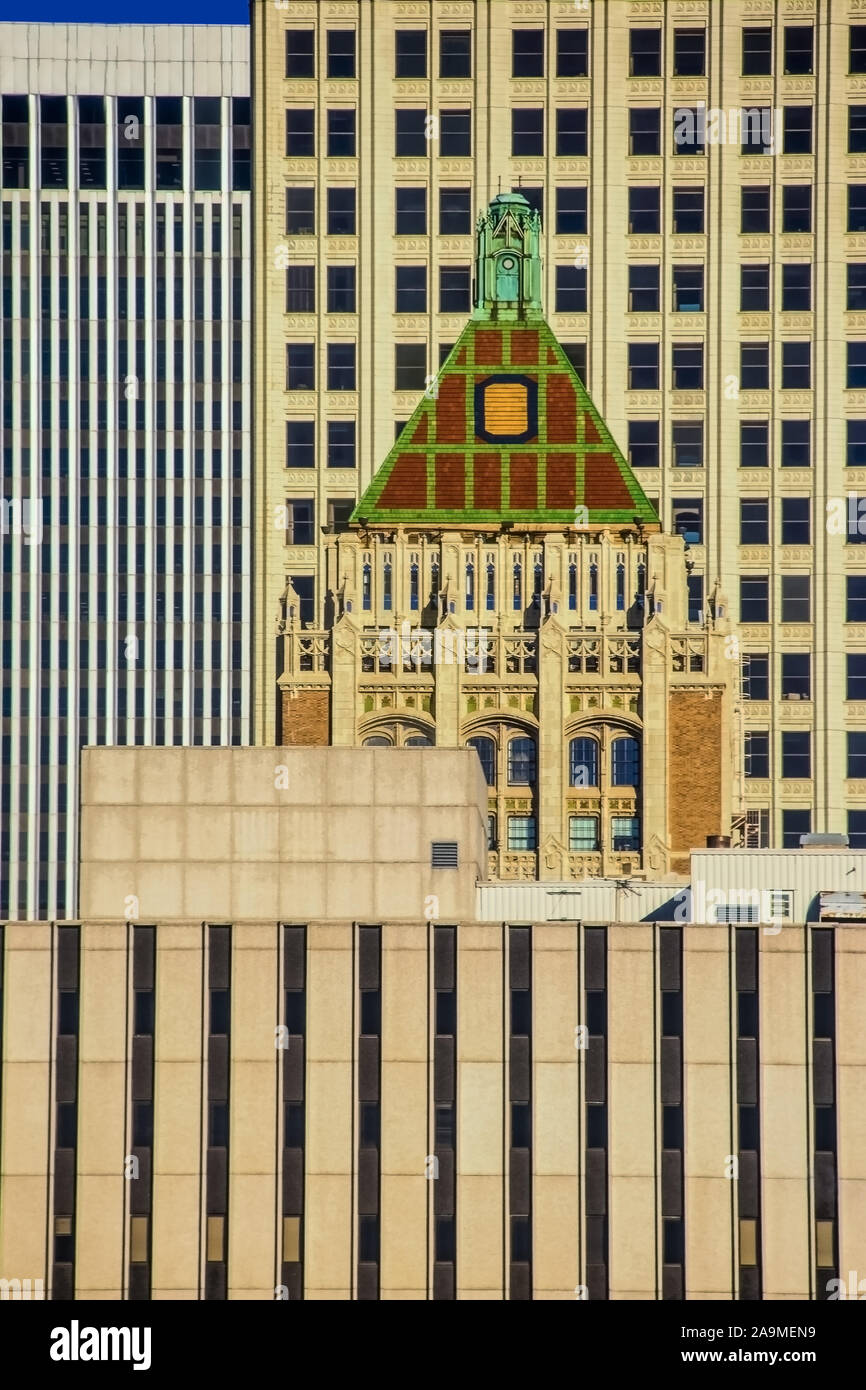 The tops of new and old buildings crowded together in downtown Tulsa OK ...