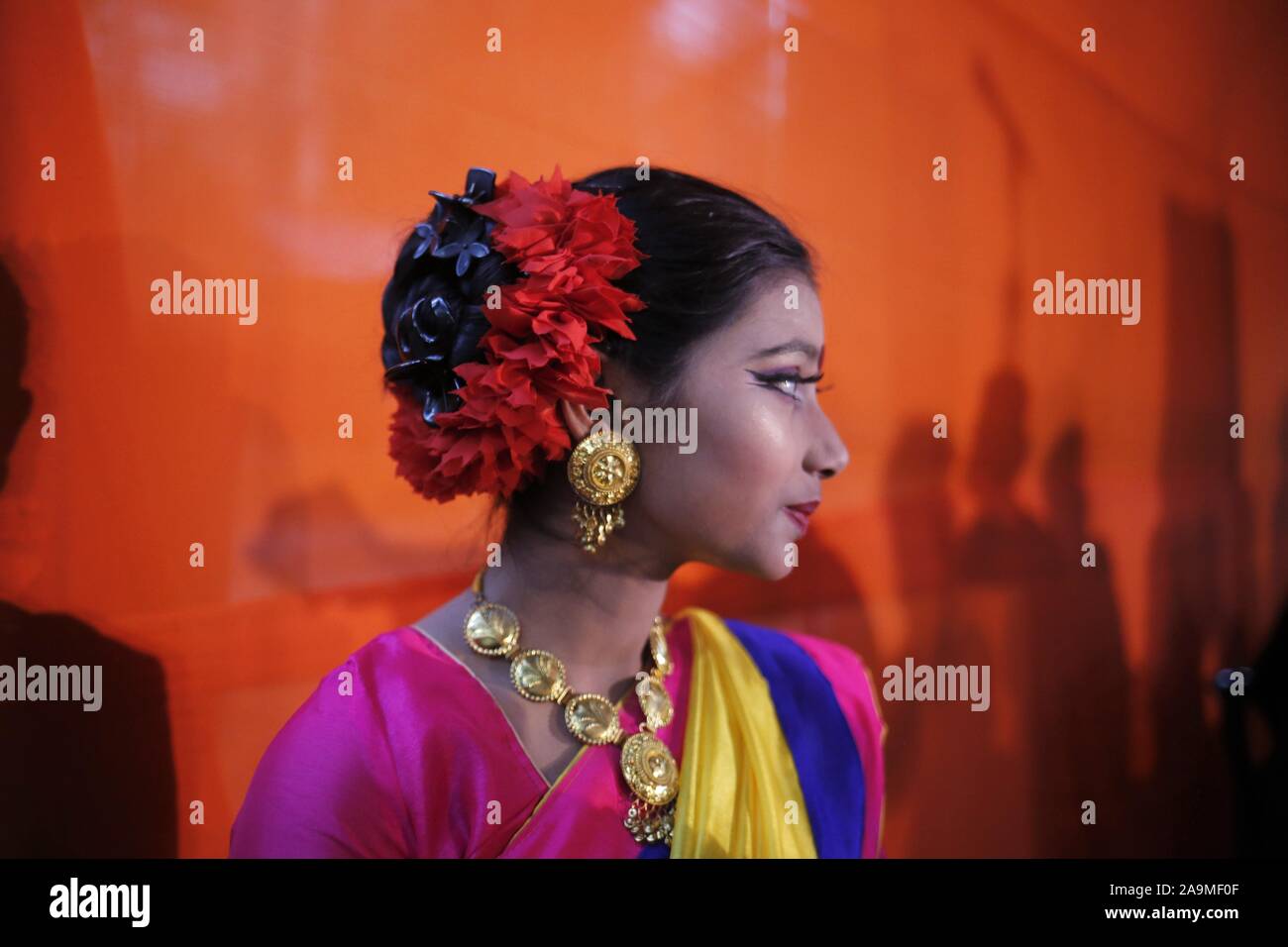 Dhaka, Bangladesh. 16th Nov, 2019. A girl waits backstage before her ...