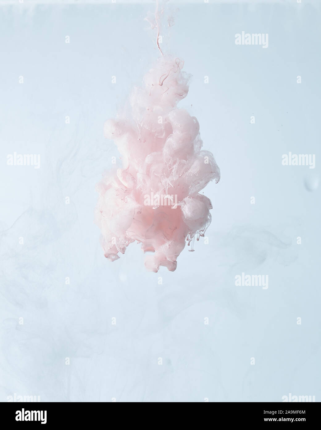 Colors dropped into liquid and photographed while in motion Stock Photo ...