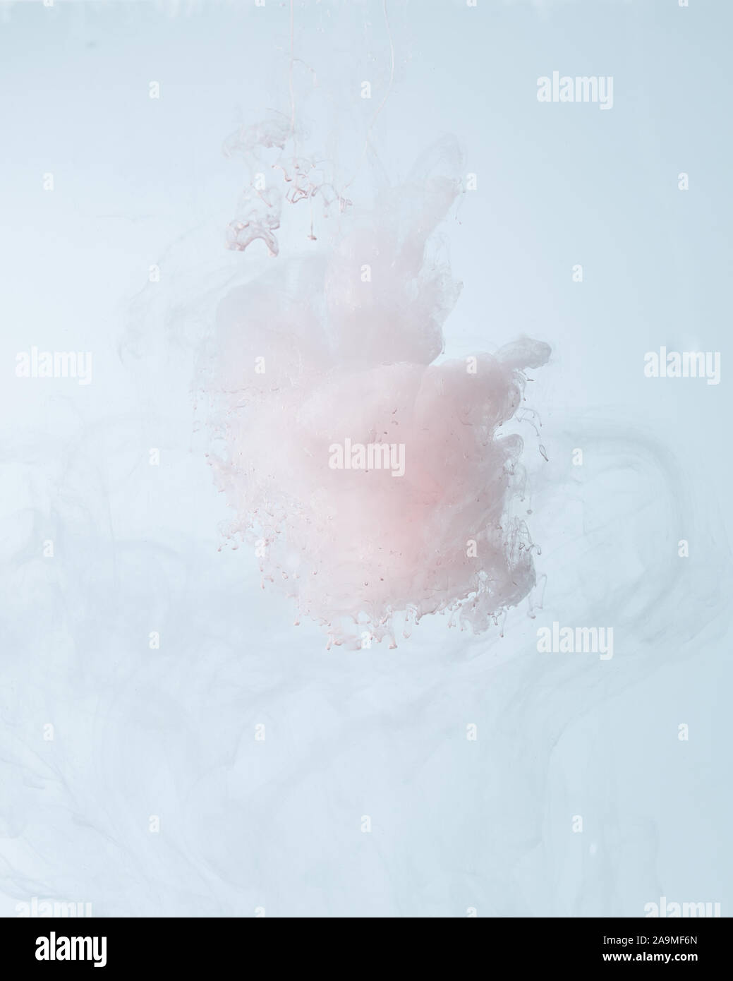 Colors dropped into liquid and photographed while in motion Stock Photo ...