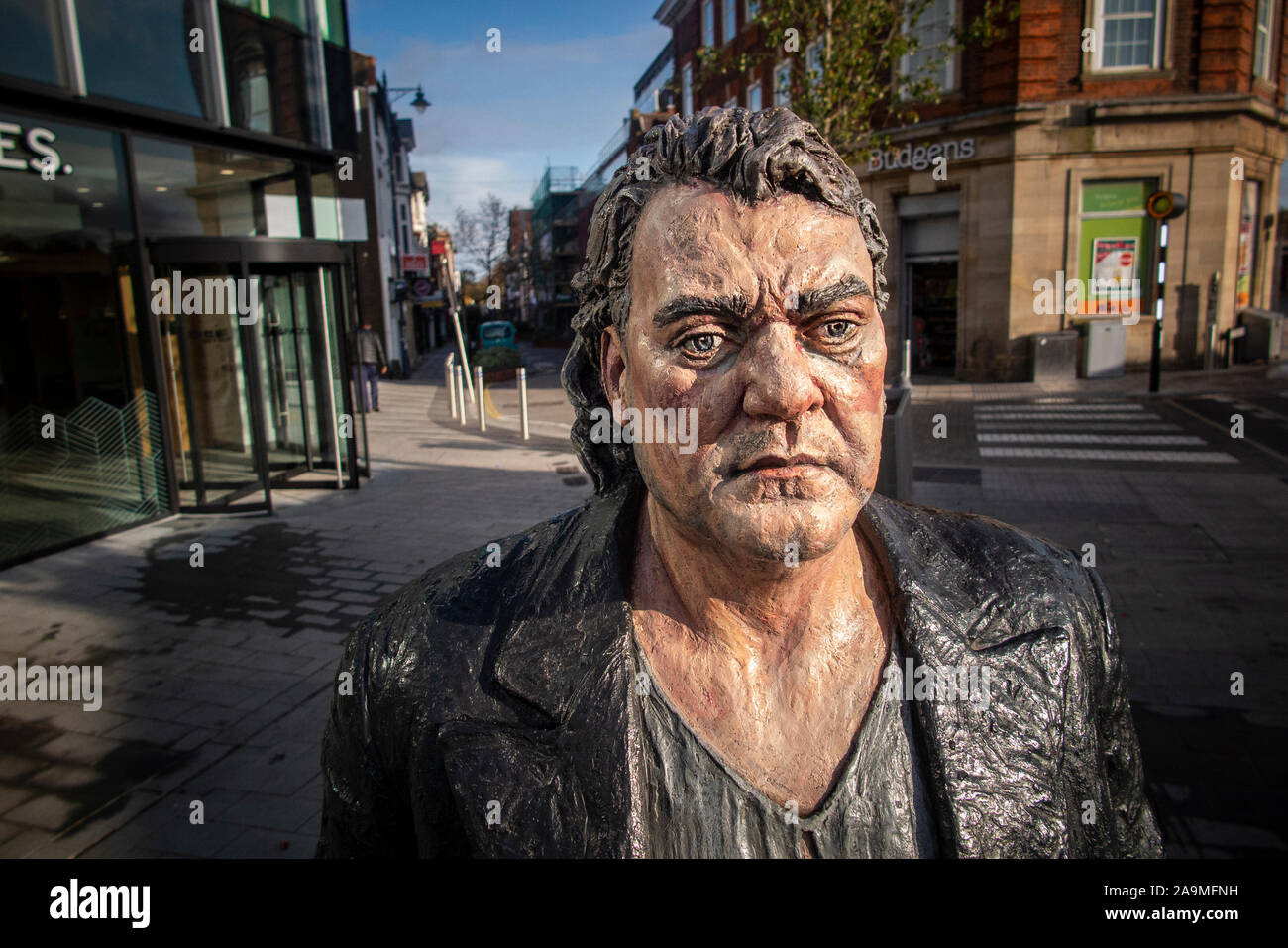 A larger than life statue by Sean Henry in central Woking, surrey Stock ...