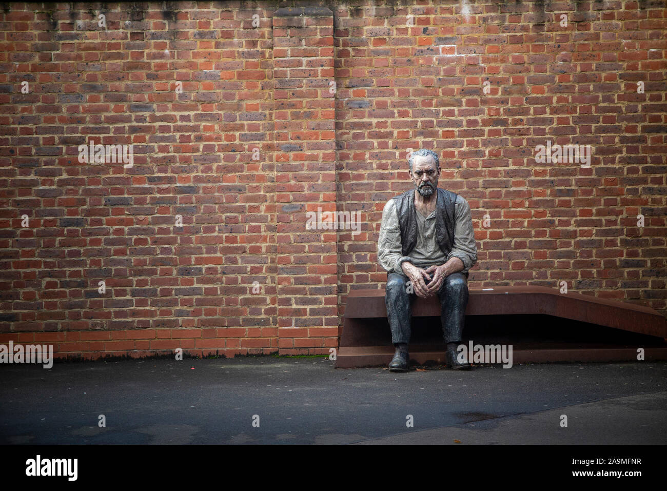 A larger than life statue by Sean Henry in Woking railway station ...