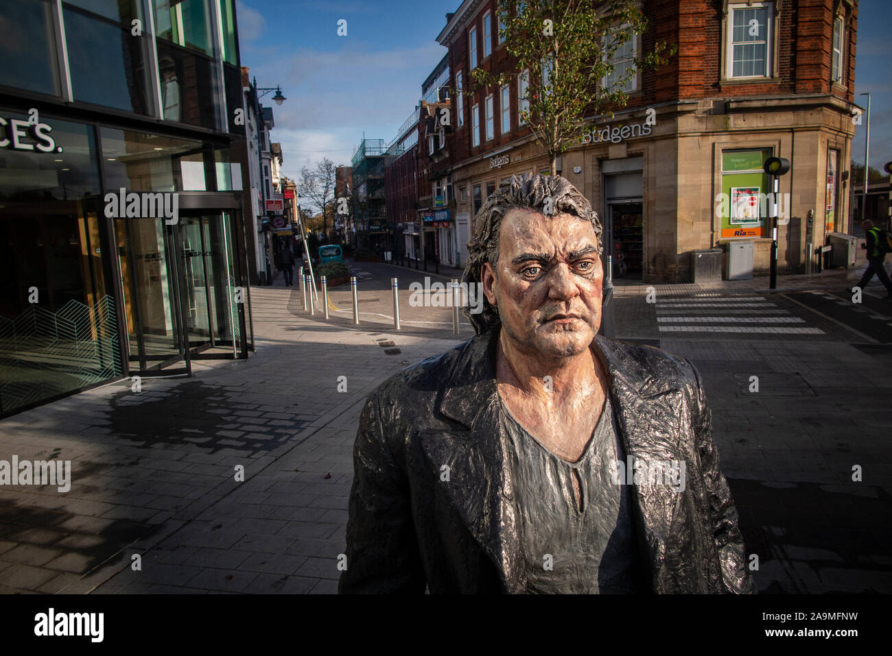 A larger than life statue by Sean Henry in central Woking, surrey Stock ...