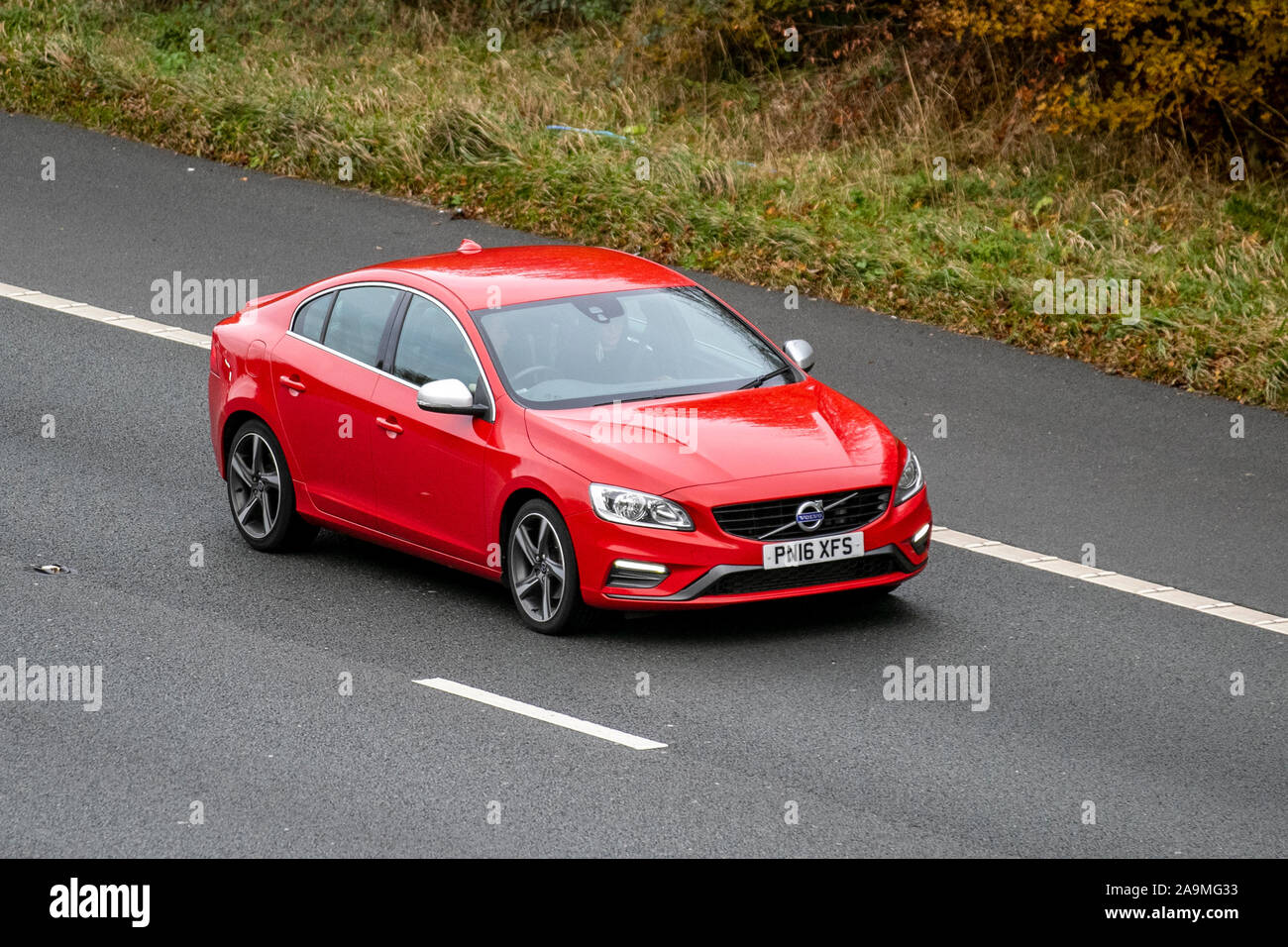 2016 red Volvo S60 R-Design D3; UK Vehicular traffic, transport, modern vehicles, saloon cars ...