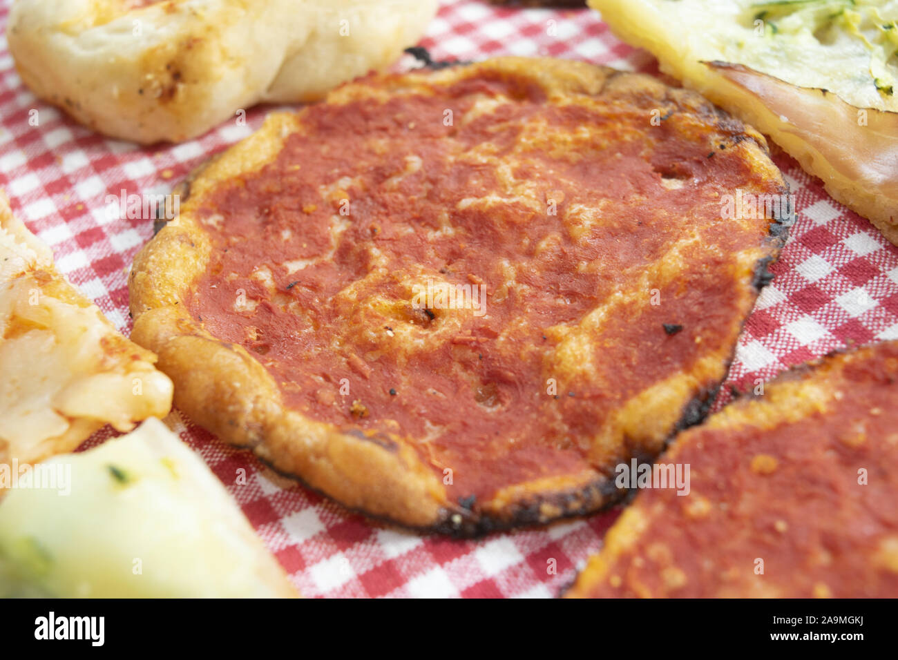 red little pizzas as snack at home Stock Photo - Alamy