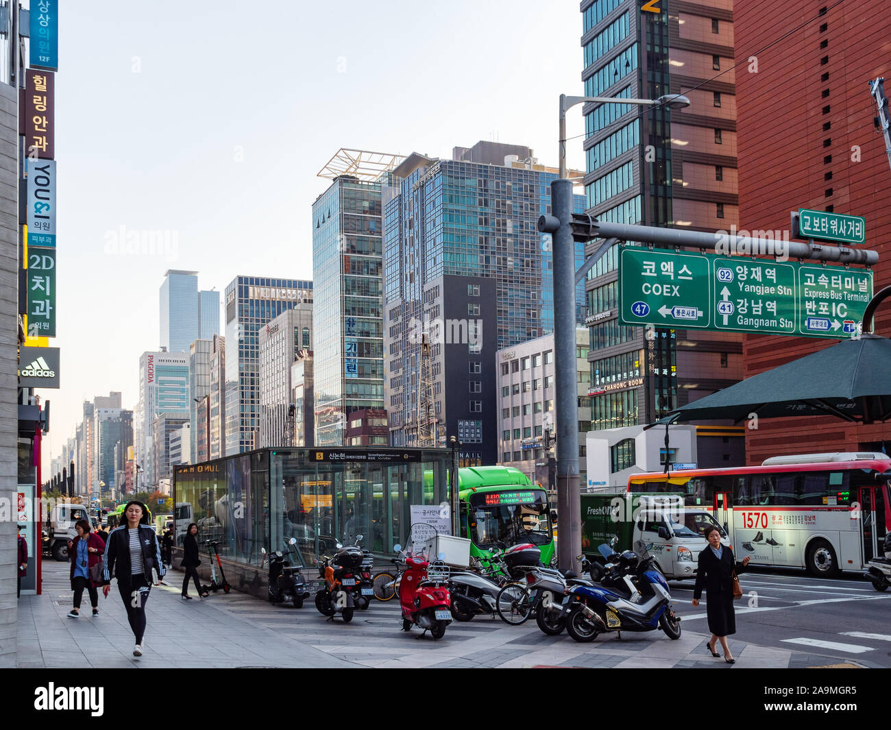 SEOUL, SOUTH KOREA - NOVEMBER 1, 2019: people on street with modern ...