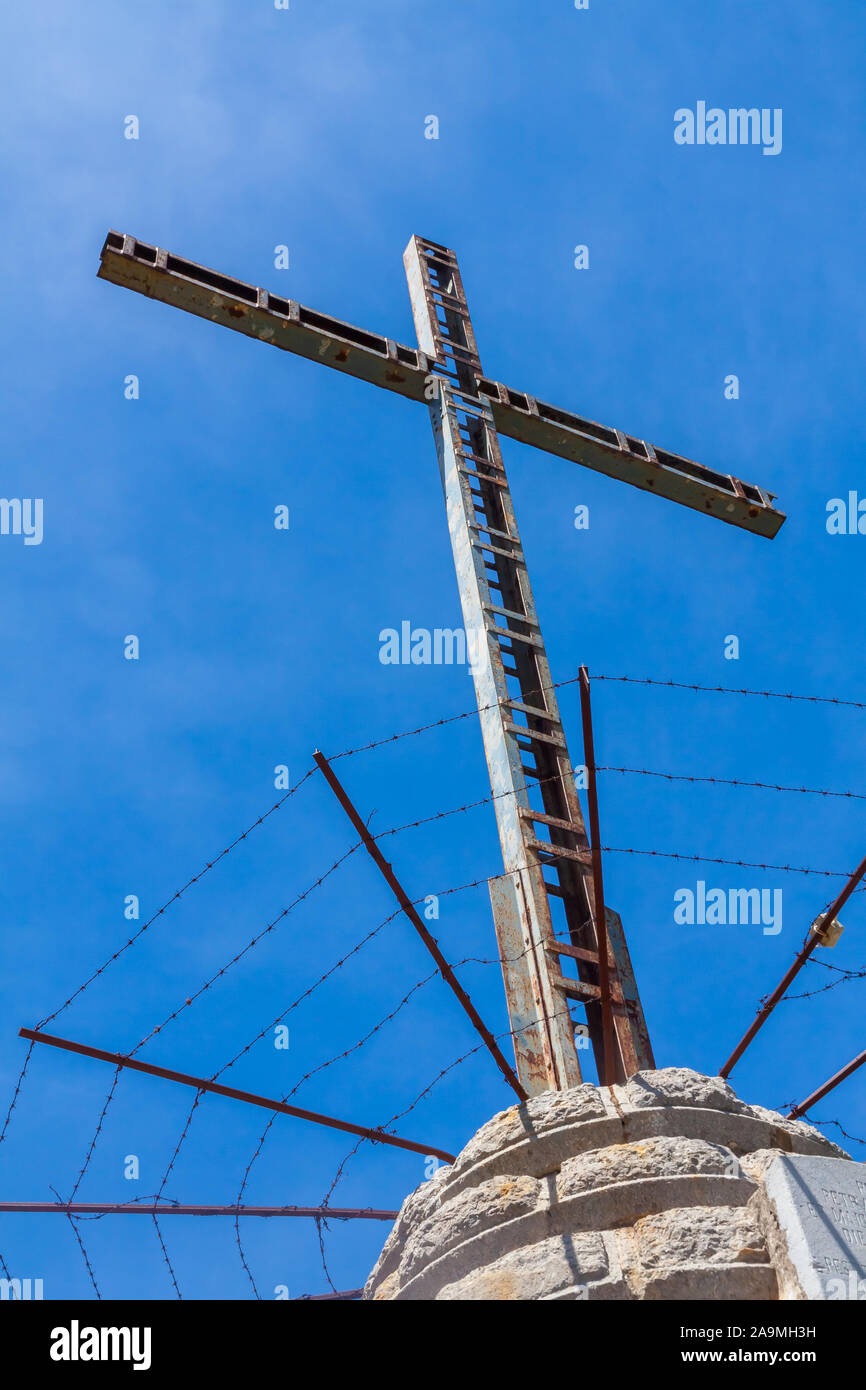 A metal cross as a symbol Stock Photo - Alamy