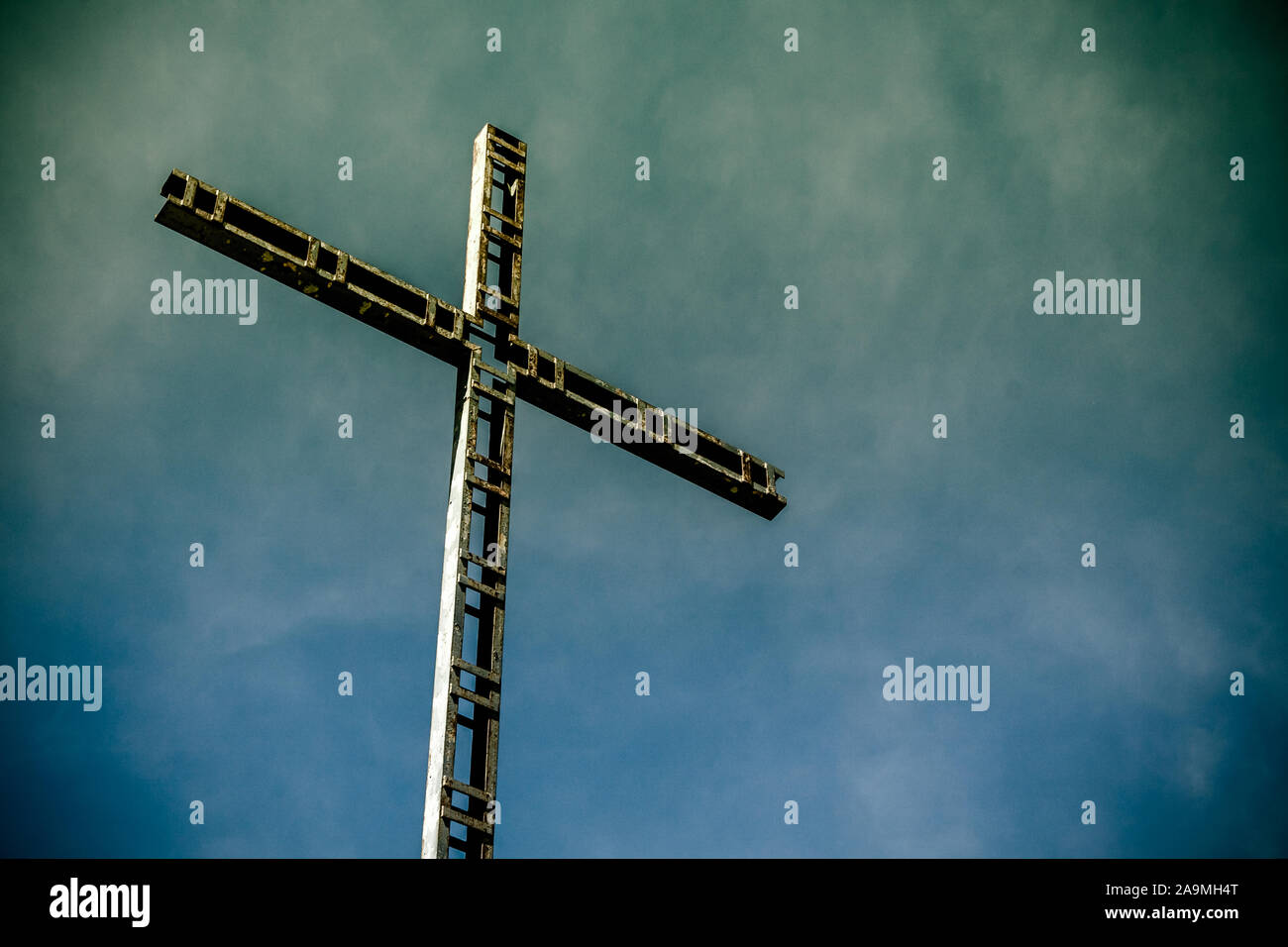 A metal cross as a symbol Stock Photo - Alamy