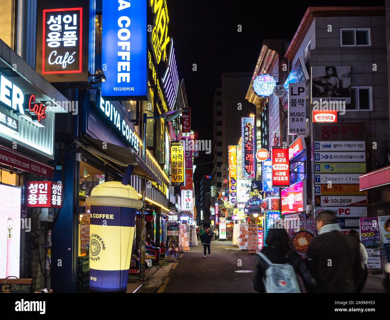 SEOUL, SOUTH KOREA - NOVEMBER 3, 2019: people walk on shopping and ...