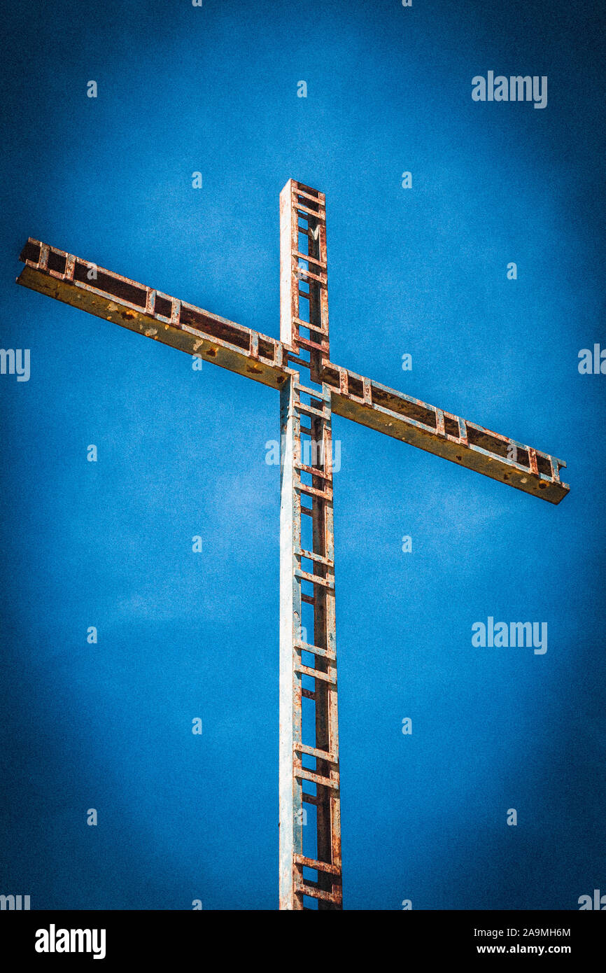 A metal cross as a symbol Stock Photo - Alamy