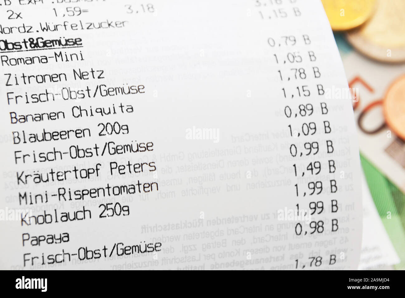 Cash receipt for Euro cash background close-up Stock Photo - Alamy