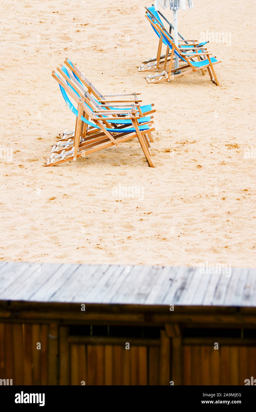 Beach chairs at the beach background Stock Photo - Alamy