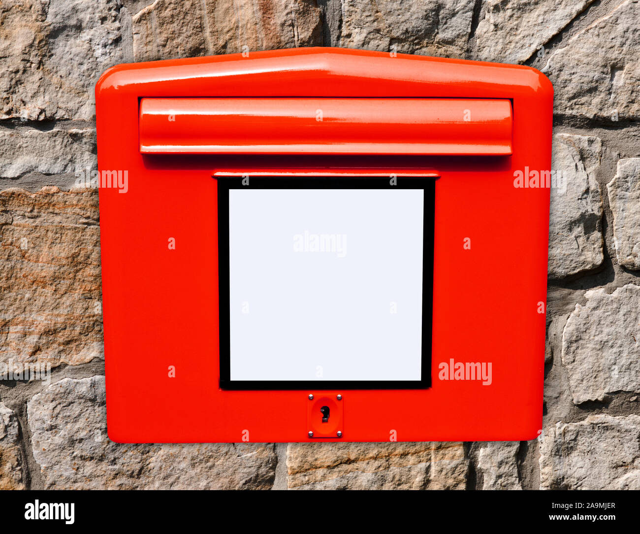 Red mailbox on wall background Stock Photo - Alamy
