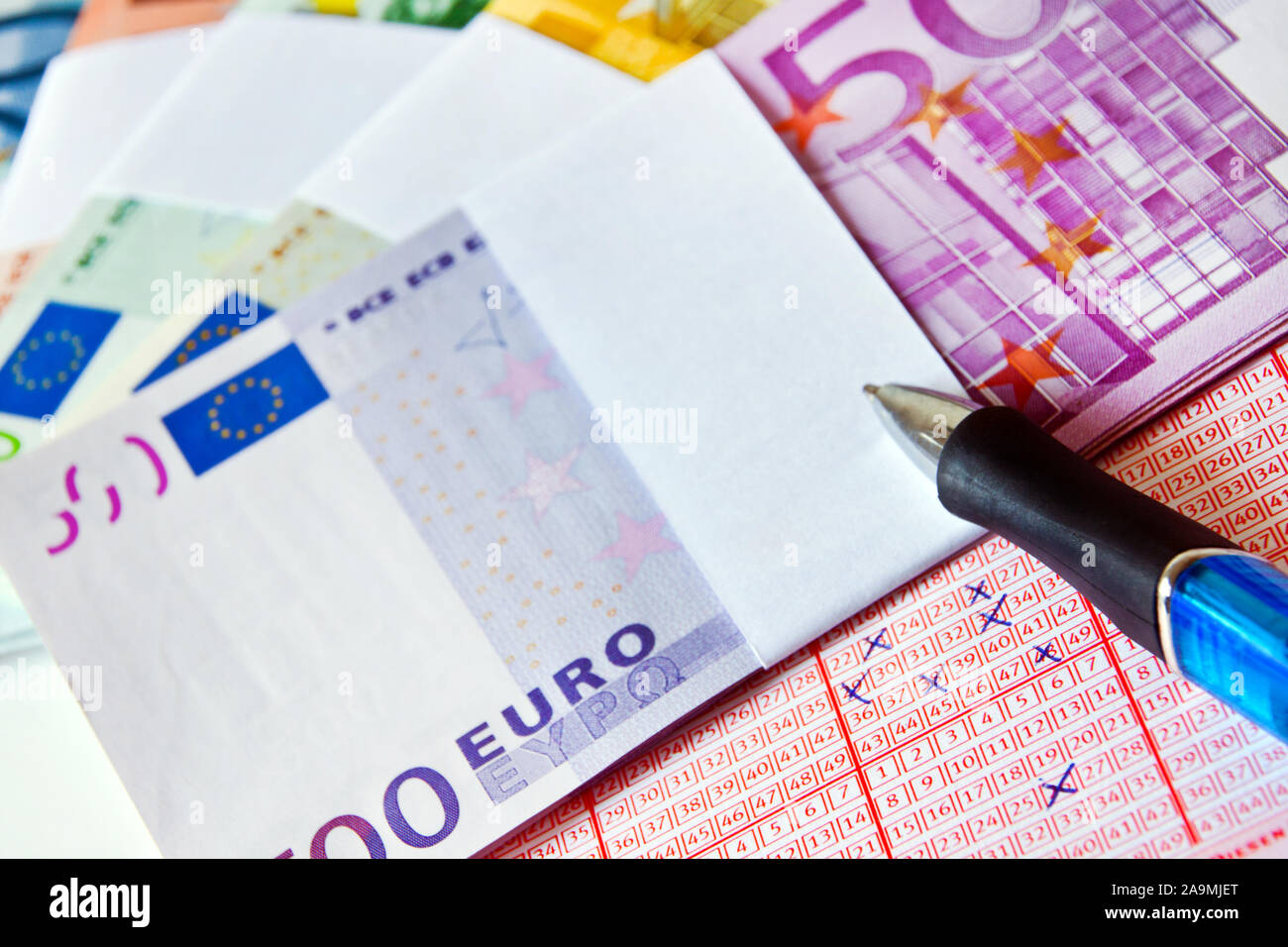 Lottery concept with euro cash as background Stock Photo - Alamy