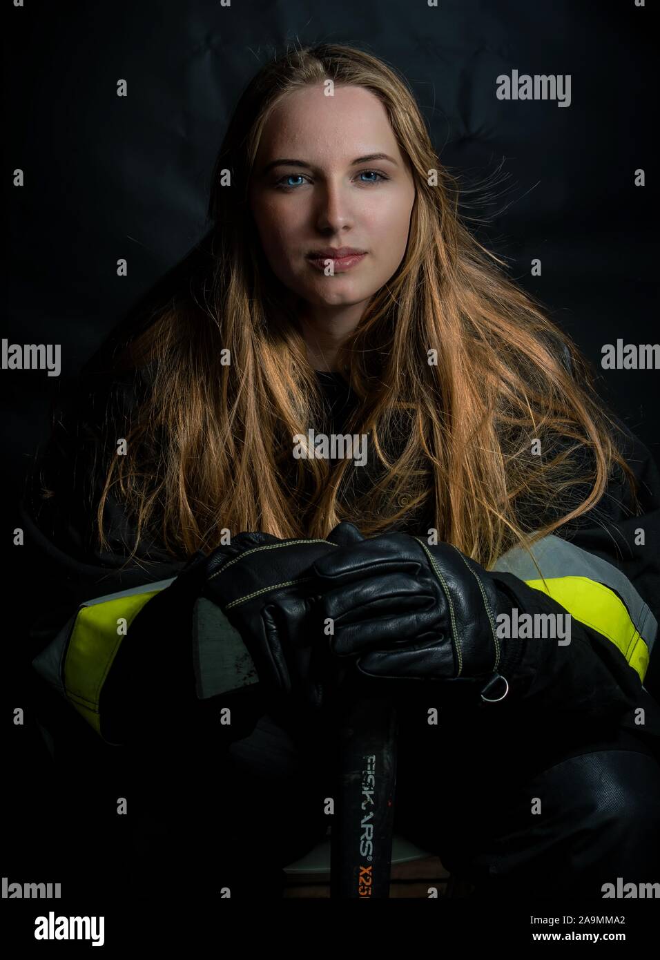 Female firefighter in uniform posing Stock Photo - Alamy