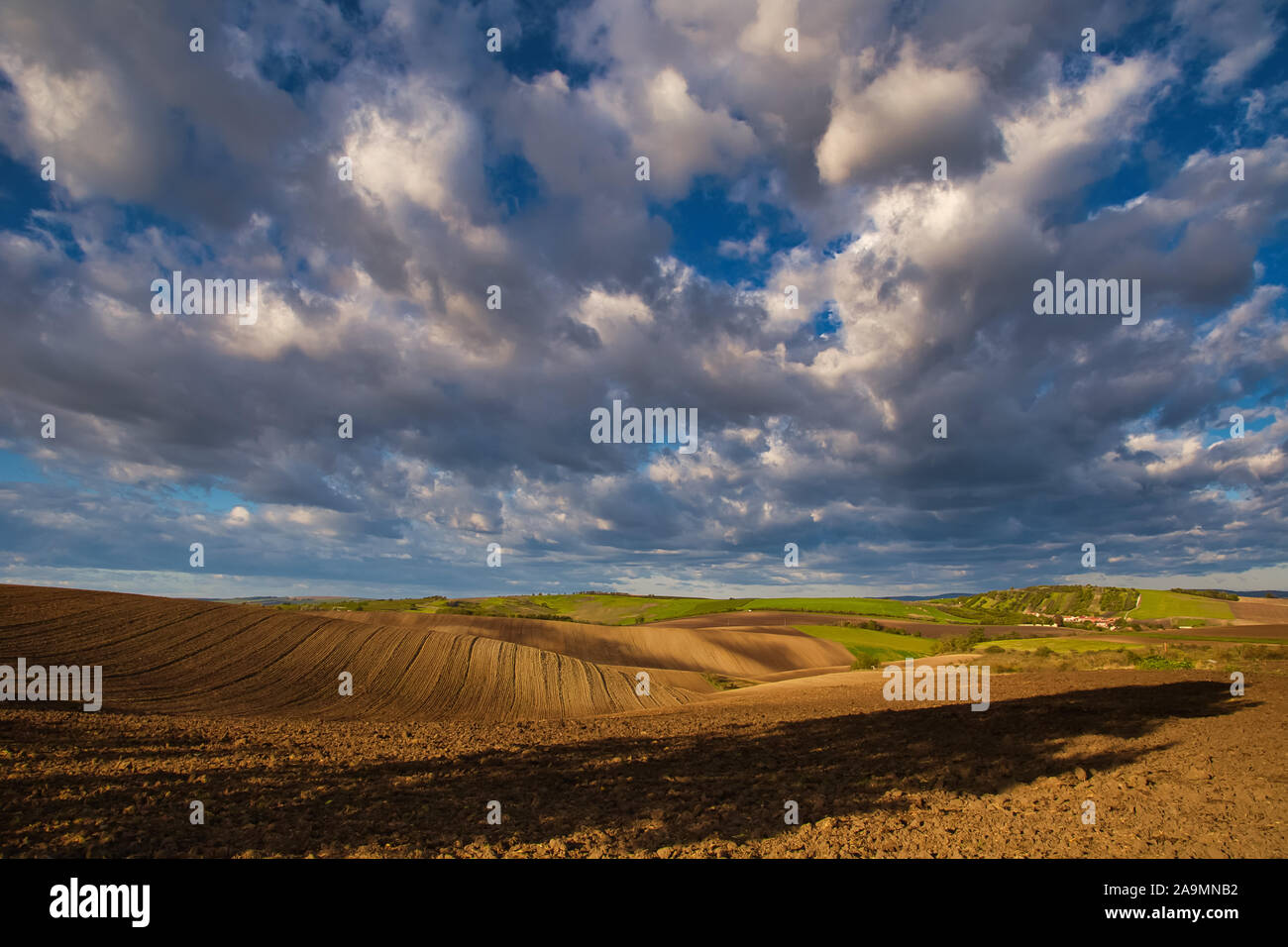 Rolling fields of South Moravia in the autumn morning with a sky full ...