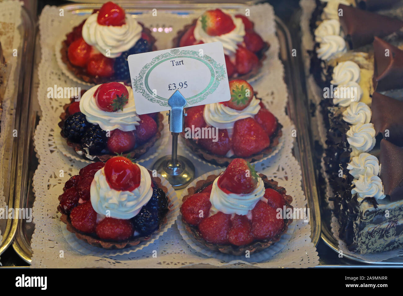 Small Strawberry Tart Sweet Dessert at Tray Stock Photo - Alamy