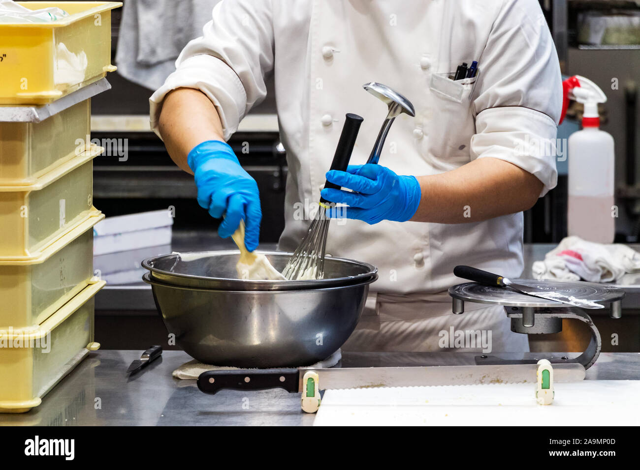 Pastry chef with whisk hi-res stock photography and images - Alamy