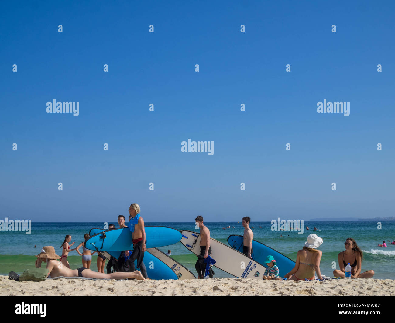 Beach goers sunbathing hi-res stock photography and images - Alamy