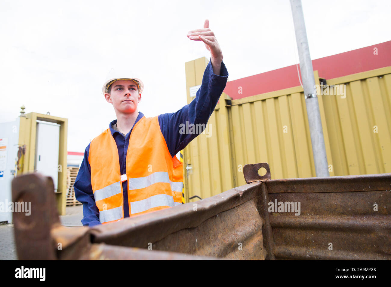 Construction worker waving hi-res stock photography and images - Alamy