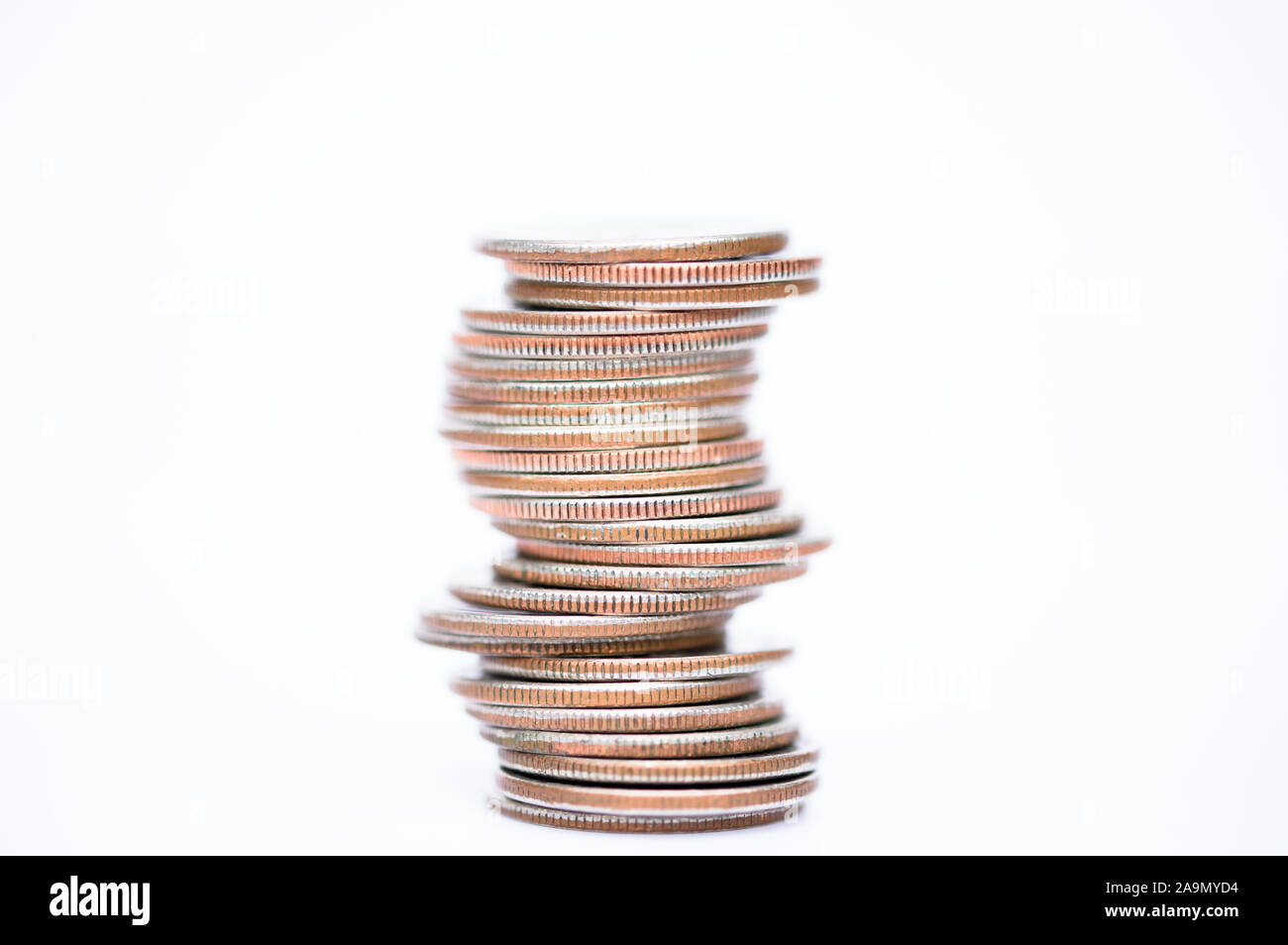 coins stacked on white background quarters and change Stock Photo - Alamy