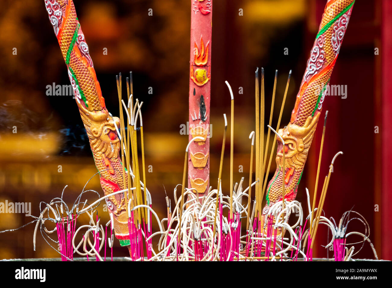 Red prayer sticks hi-res stock photography and images - Alamy