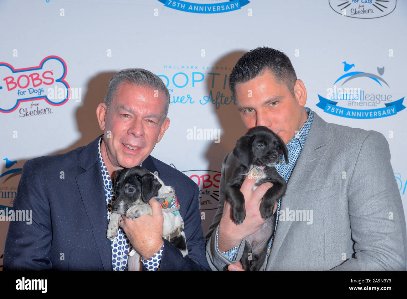 NEW YORK, NY - NOVEMBER 15: Elvis Duran and Alex Carr attend the North ...