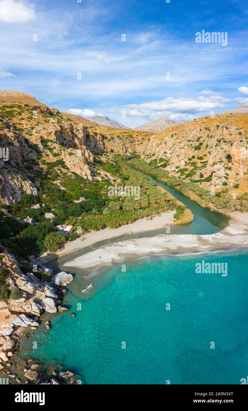 Panorama of Preveli beach at Libyan sea, river and palm forest ...