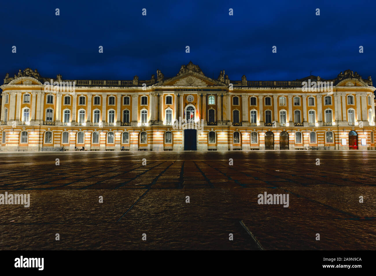 Place du Capitole at night with dark blue dramatic sky in Toulouse ...