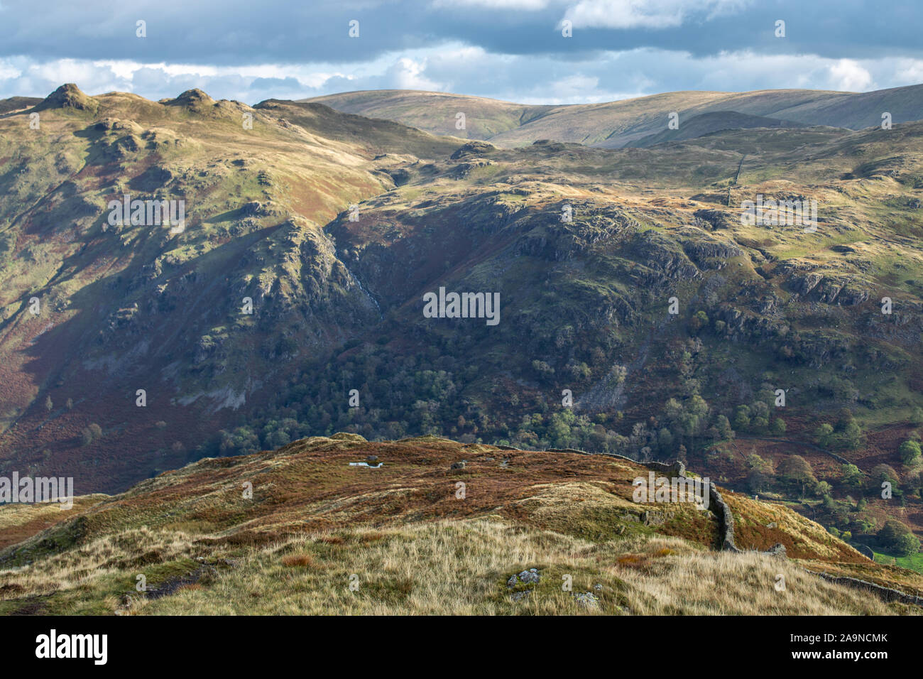 Gale Crag ridge and Stony Rigg in background at sunny autumnal day in ...